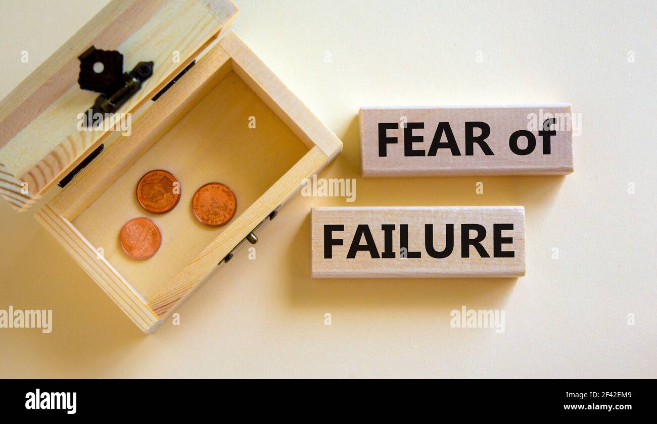 Fear of failure symbol. Wooden blocks with words 'fear of failure ...