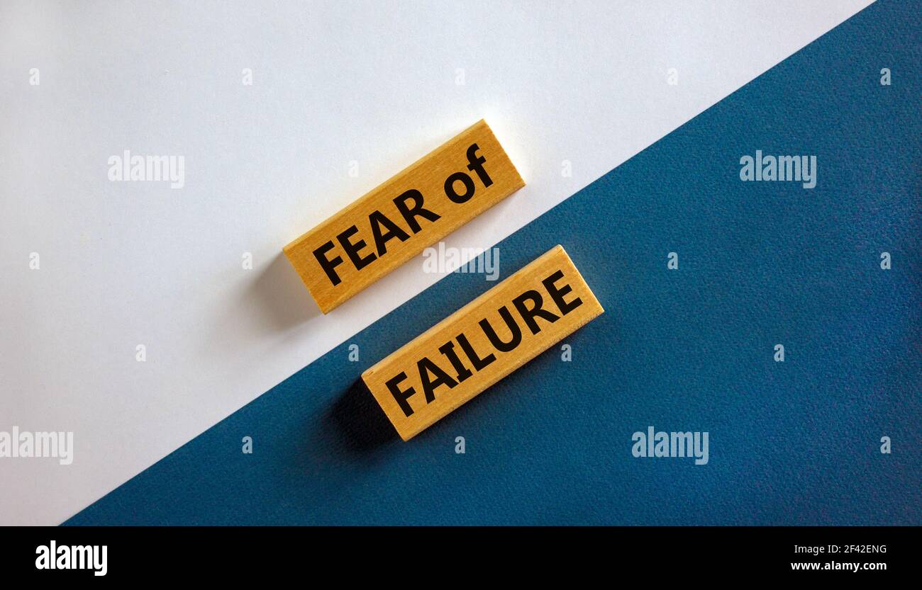 Fear of failure symbol. Wooden blocks with words 'fear of failure ...