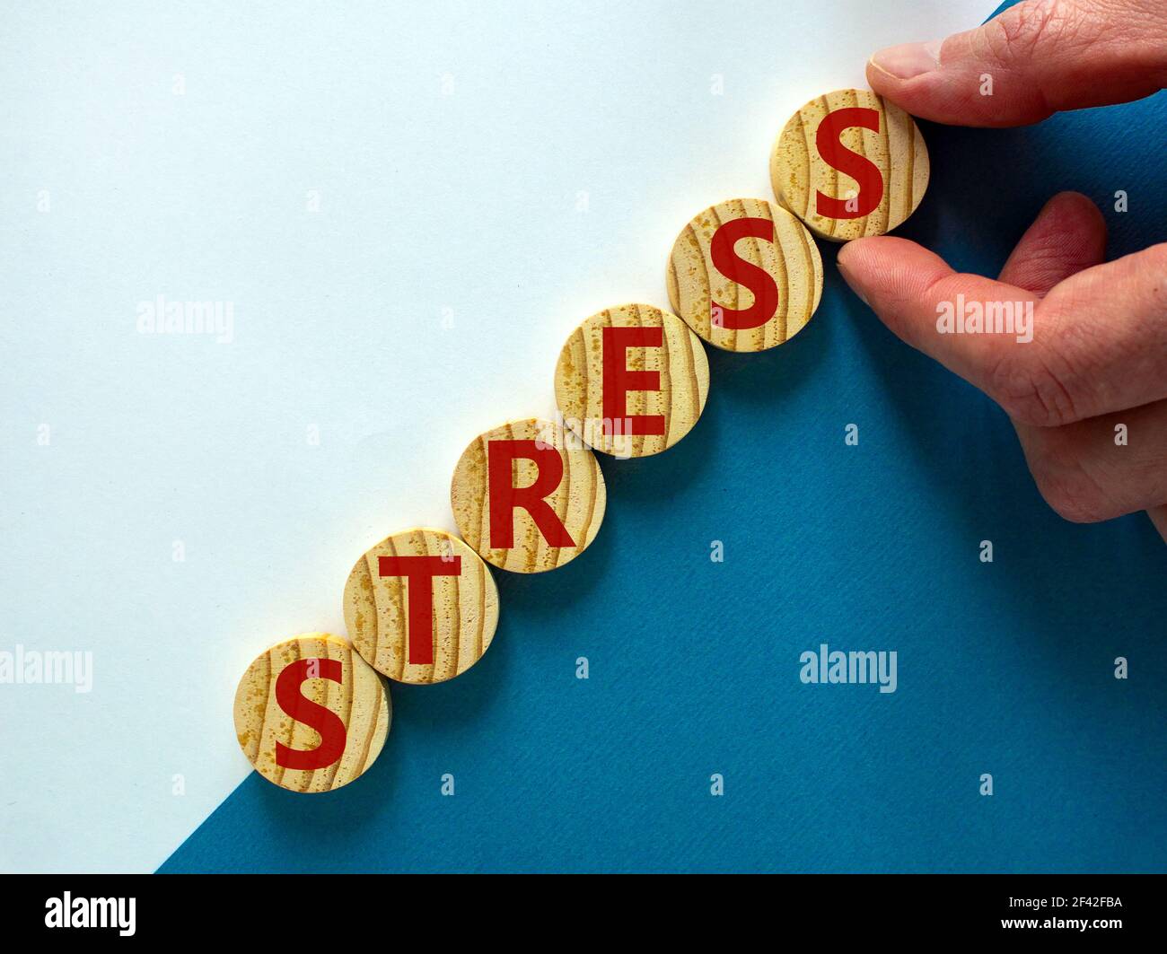 Stop stress and be health symbol. Doctor holds wooden circles with the ...