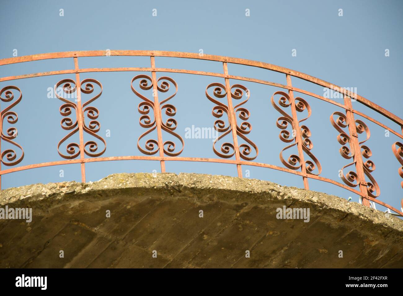 Modern red balcony, red openwork wrought iron fence with heart shapes ...