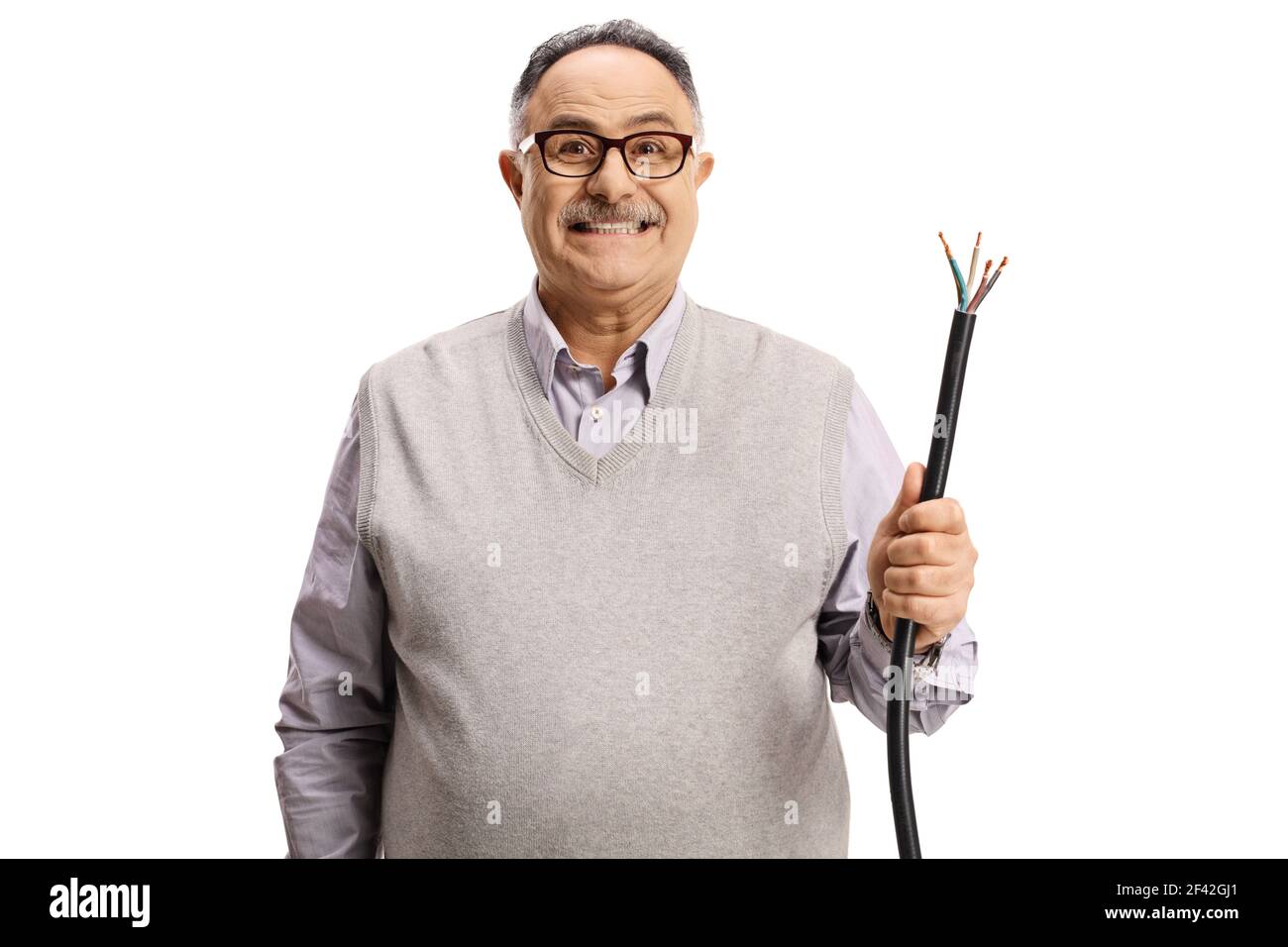Guilty mature man holding a broken elecrtic cable isolated on white ...