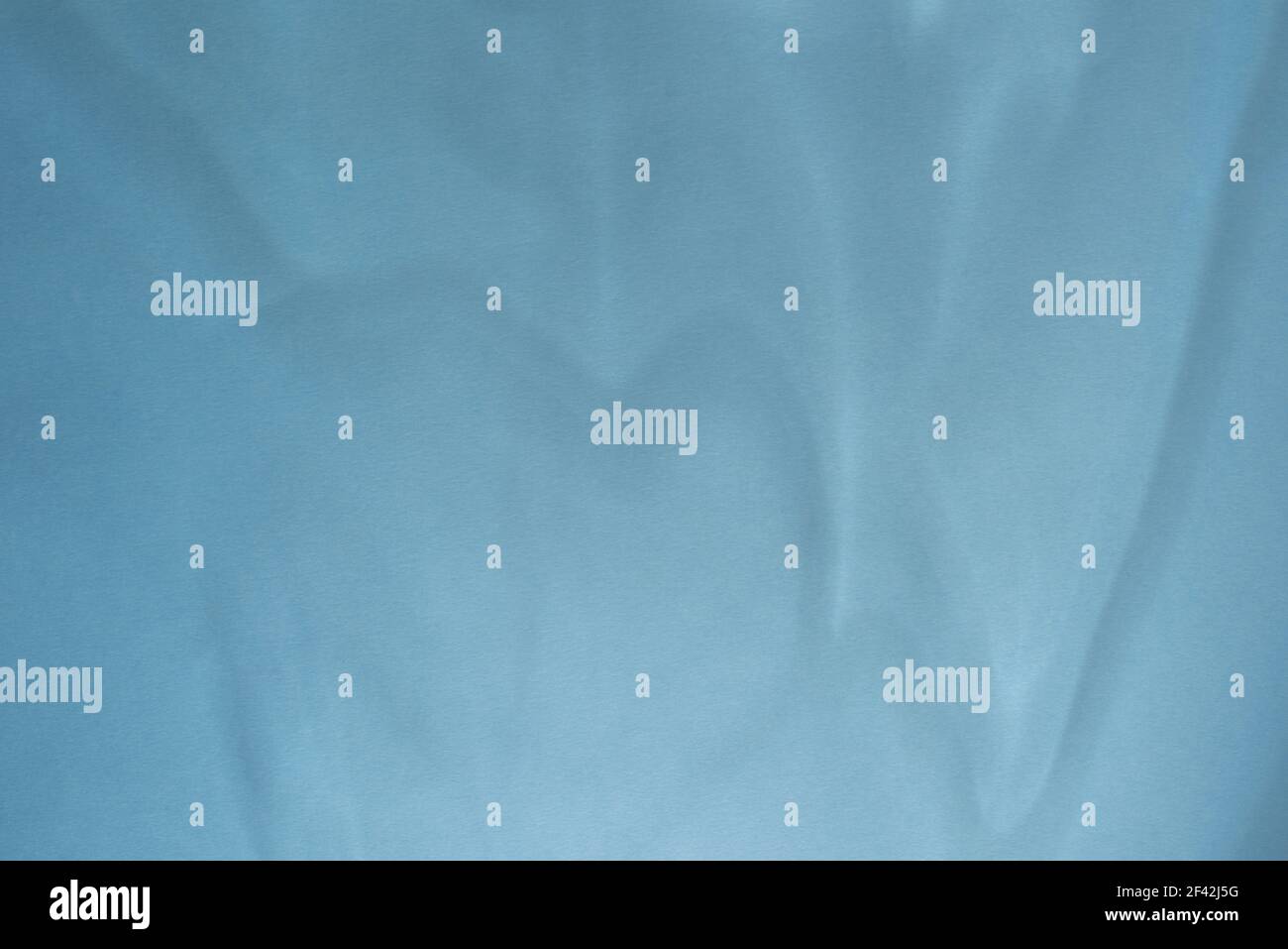 Abstract shadow on blue background. Blue paper surface with smooth ...