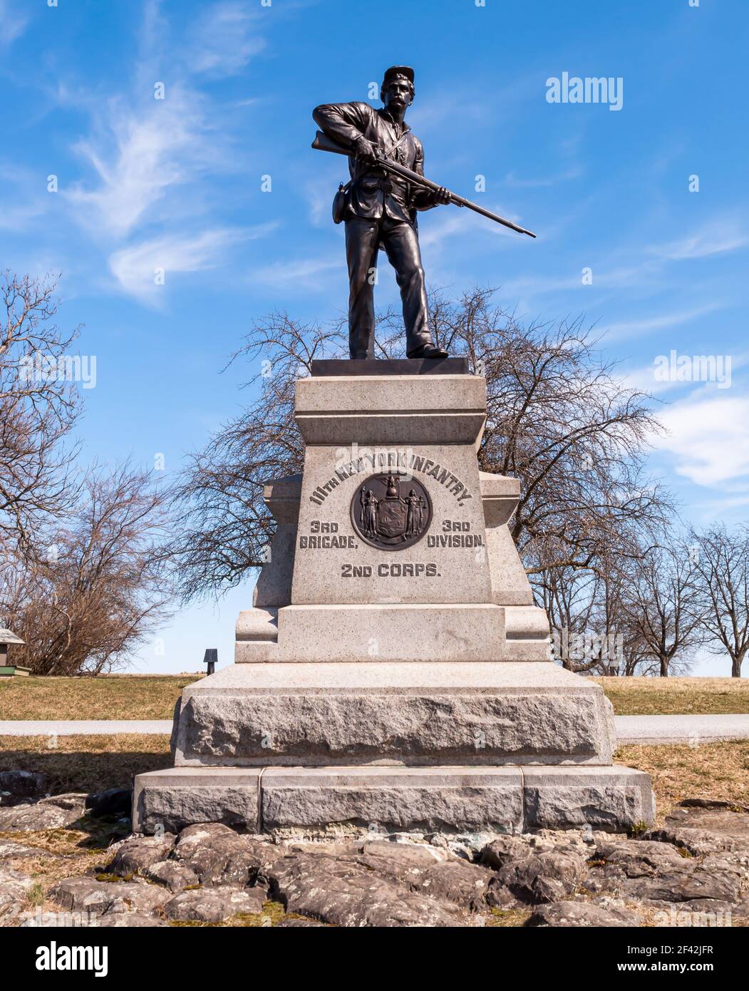 A military monument dedicated to the 111th New York Infantry with ...