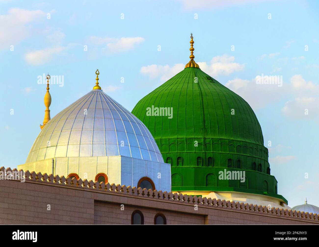 The famous green and silver domes of the Prophet's Mosque. The mosque ...