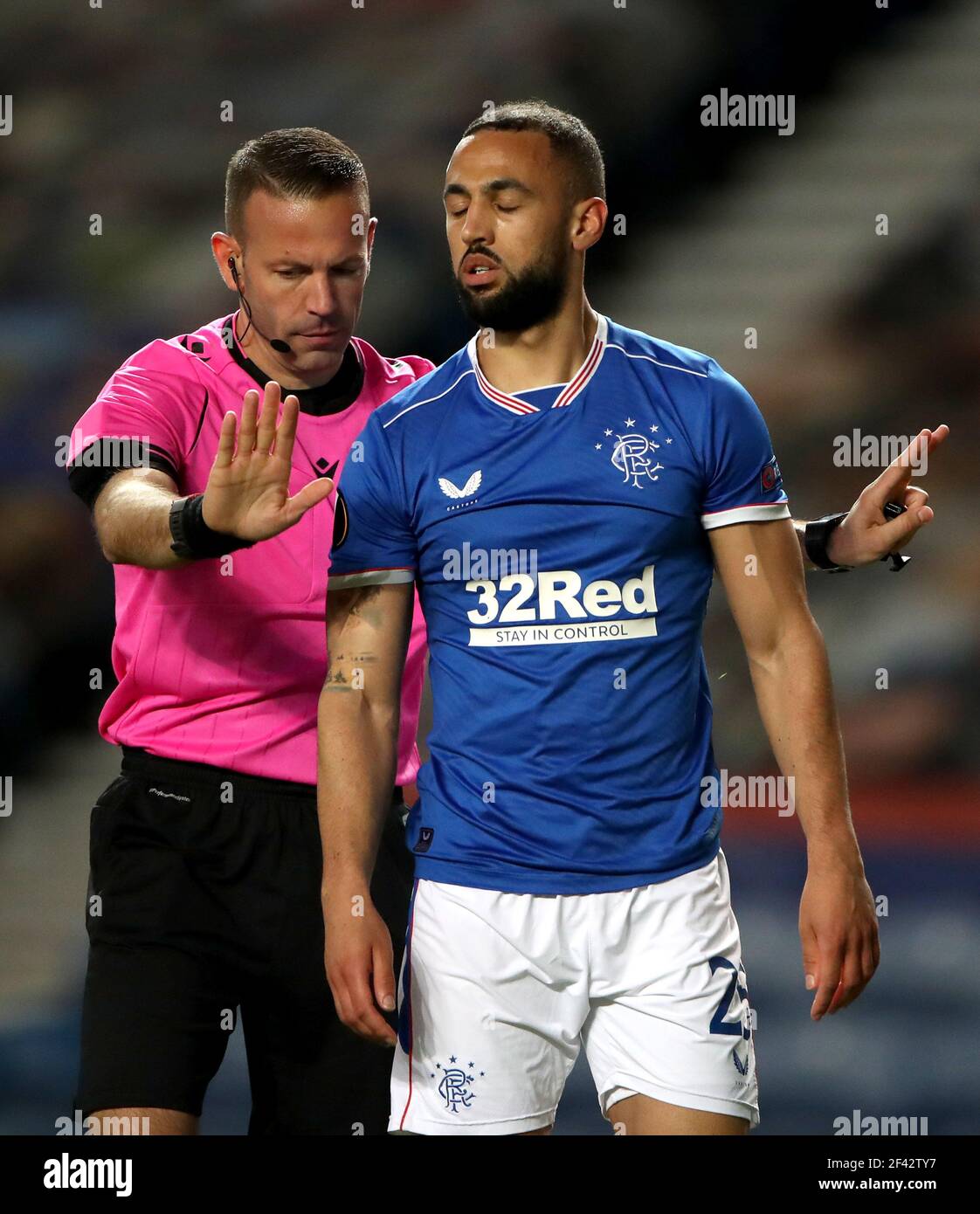 Rangers' Kemar Roofe reacts after being shown a red card by referee ...