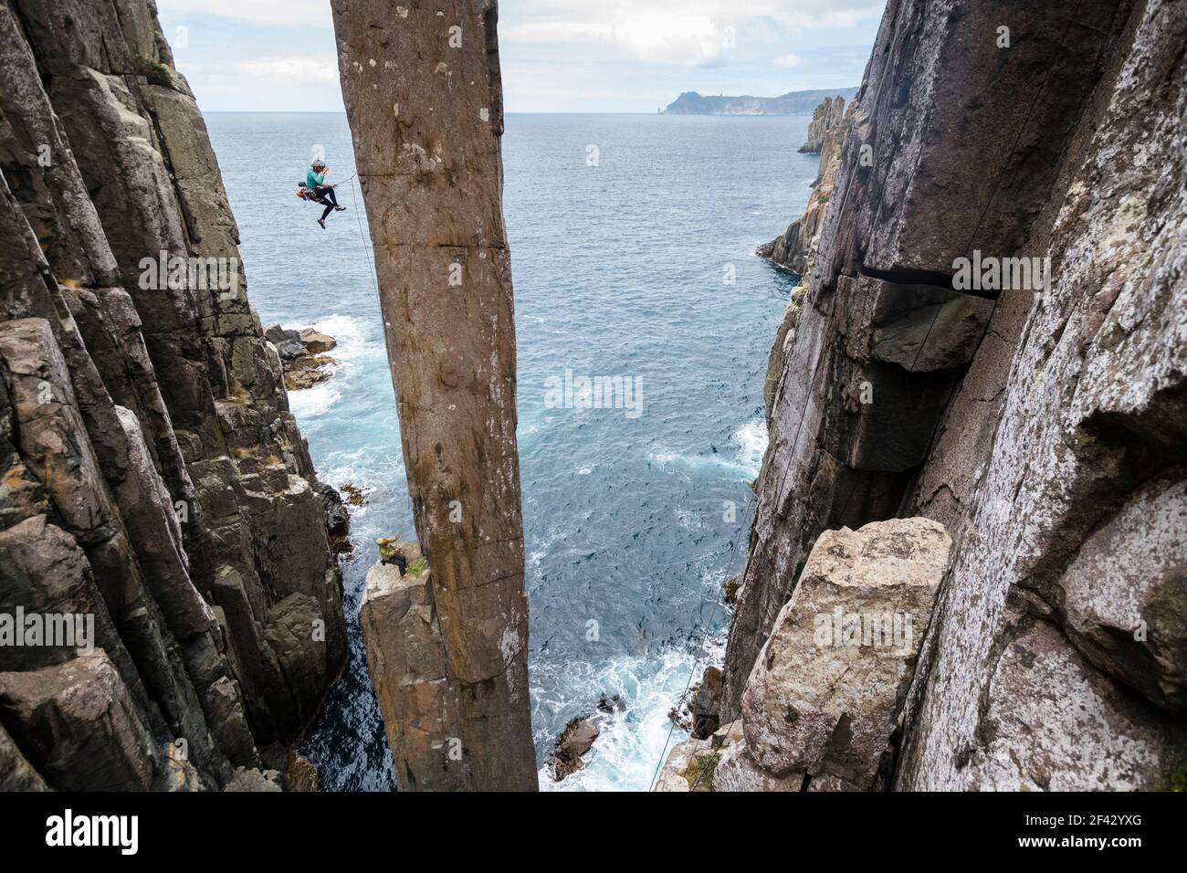 Female rockclimber falls as she tries to climb The Totem Pole, an ...