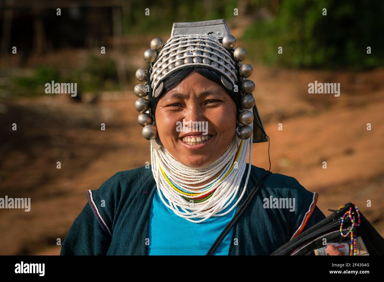 Portrait of smiling adult woman of Akha tribe near Kengtung, Myanmar ...