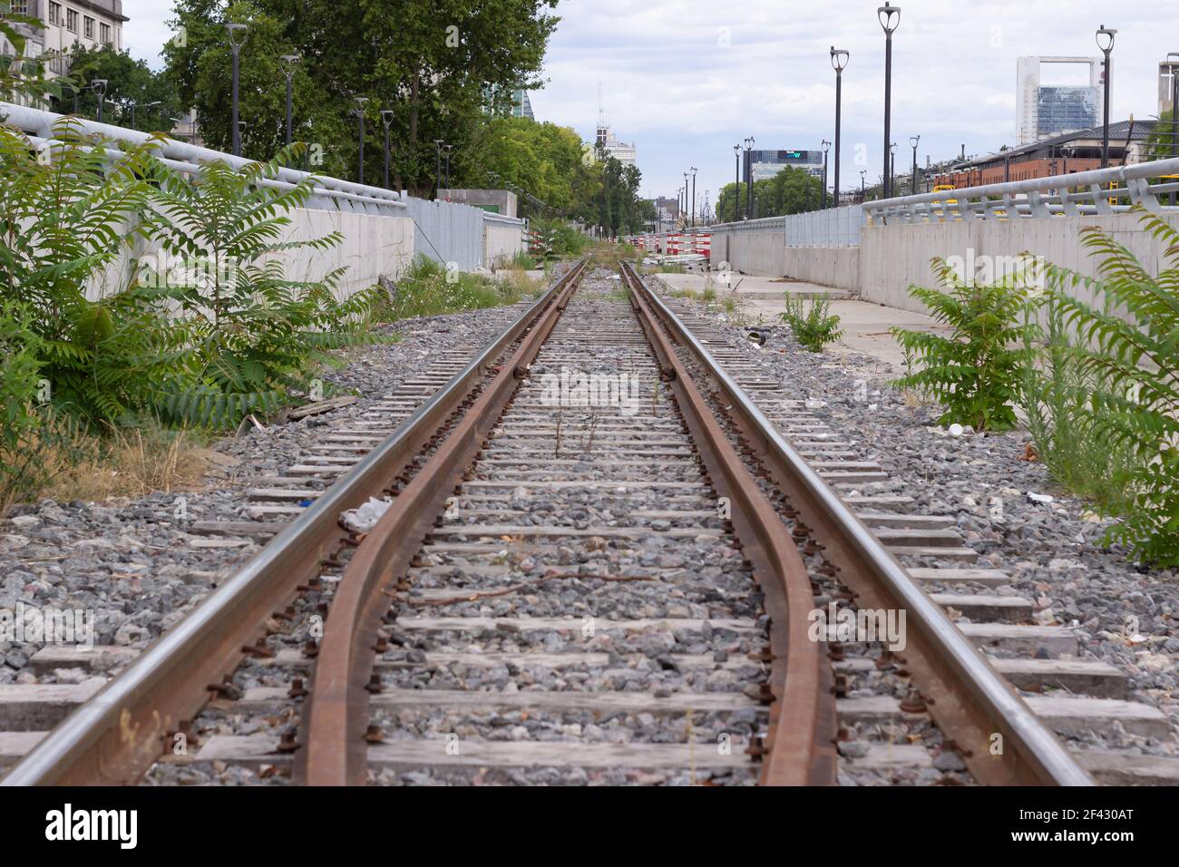 Abandoned train tracks in the city Stock Photo - Alamy