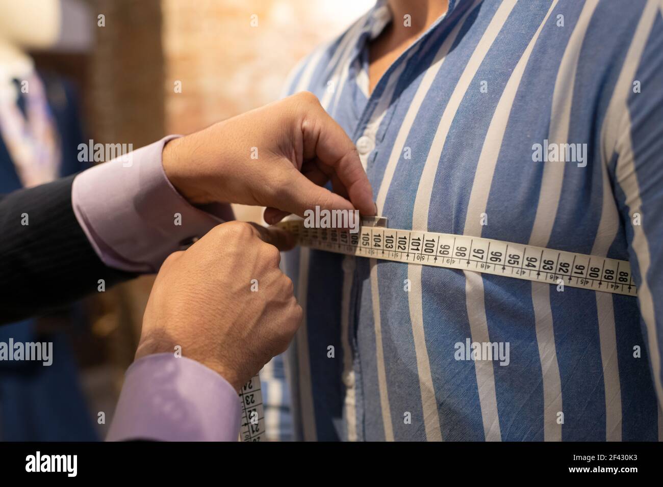 Chest measuring hi-res stock photography and images - Alamy