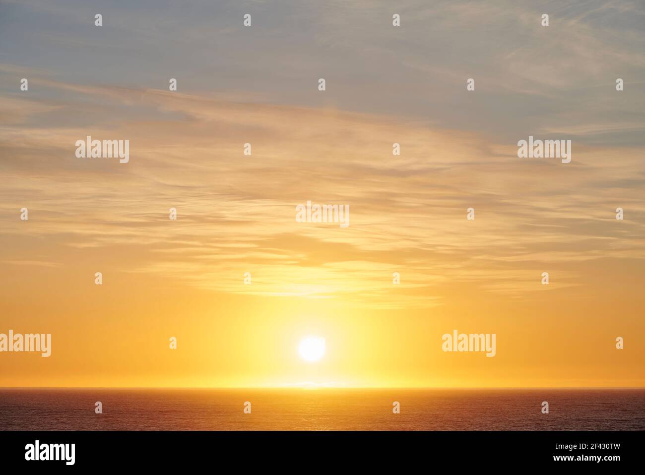 Cloudy sundown sky over sea Stock Photo - Alamy