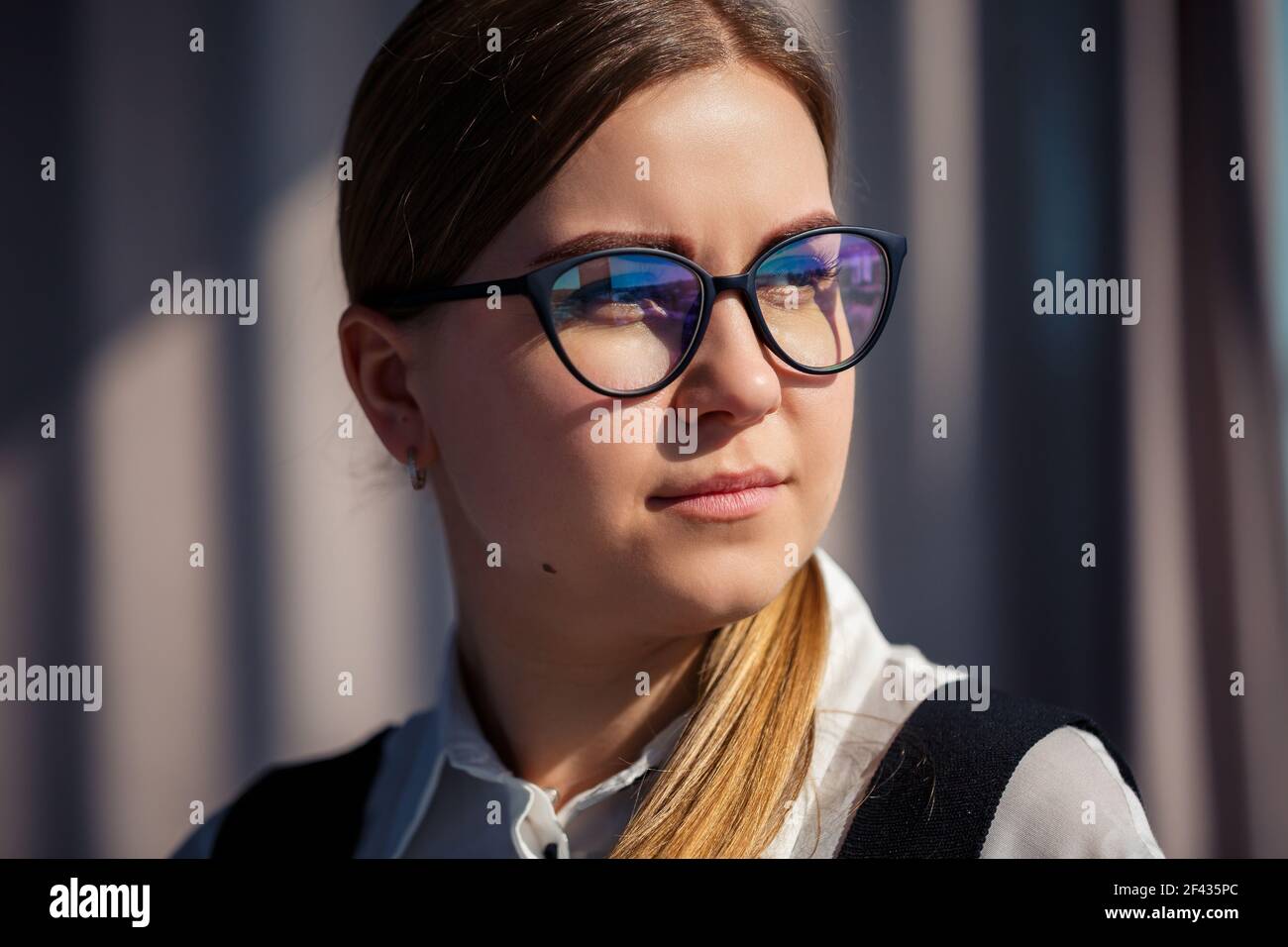 Confident business woman boss standing in modern office wearing glasses ...