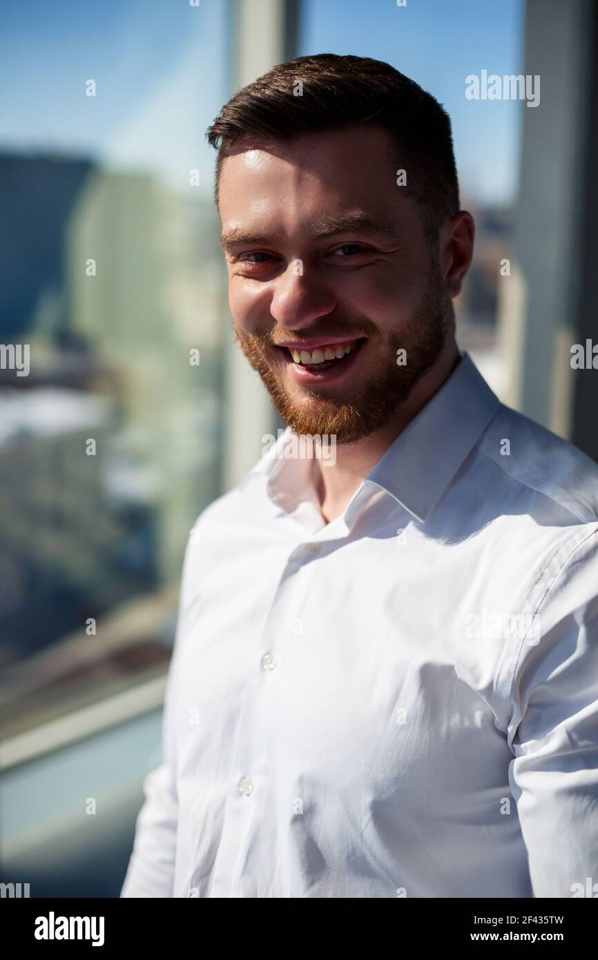 Confident businessman, boss man standing in modern office, successful ...