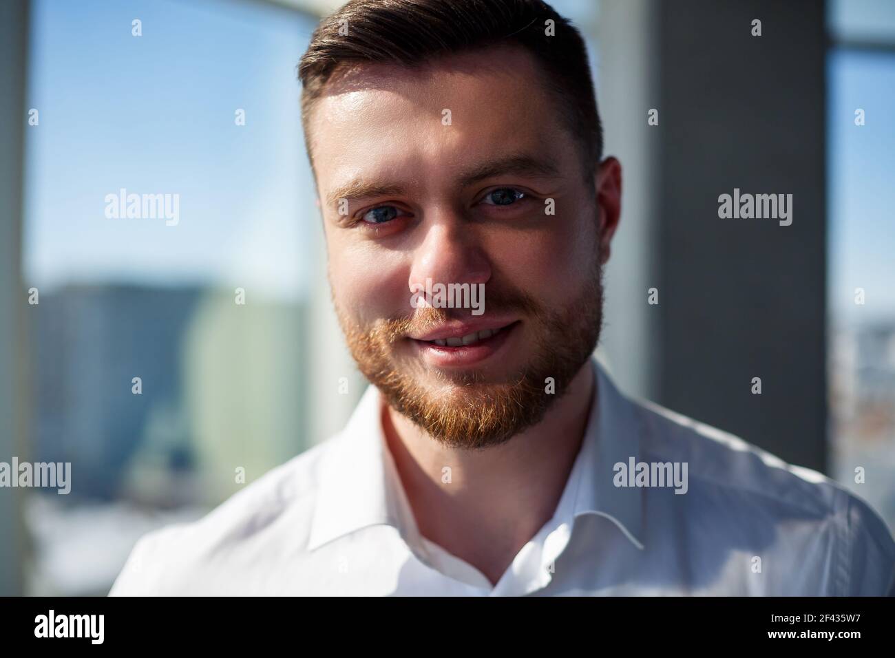 Confident businessman, boss man standing in modern office, successful ...