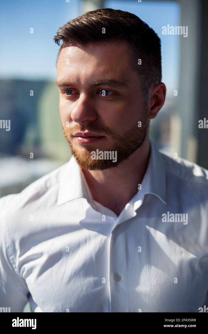 Confident businessman, boss man standing in modern office, successful ...