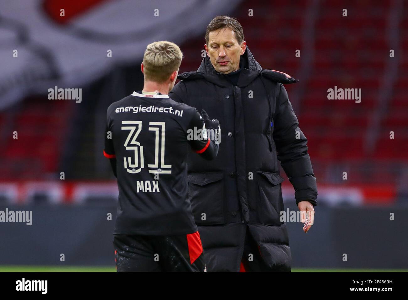 AMSTERDAM, NETHERLANDS - FEBRUARY 10: Philipp Max of PSV, coach Roger ...