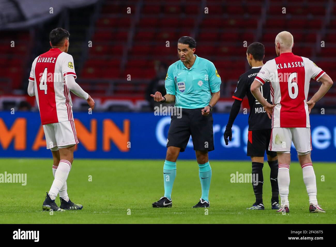 AMSTERDAM, NETHERLANDS - FEBRUARY 10: Edson Alvarez of Ajax, referee ...