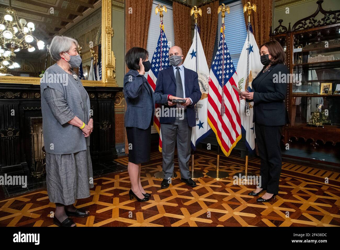 Washington, DC, USA. 18th Mar, 2021. US Vice President Kamala Harris (R ...