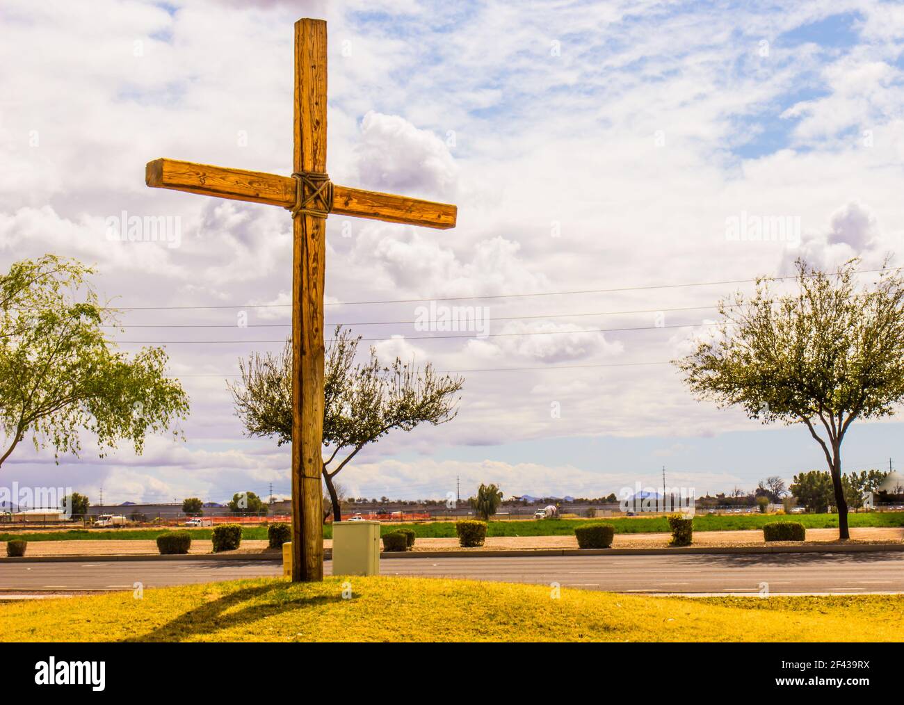 Weathered Wooden Cross On Grass Knoll Stock Photo - Alamy