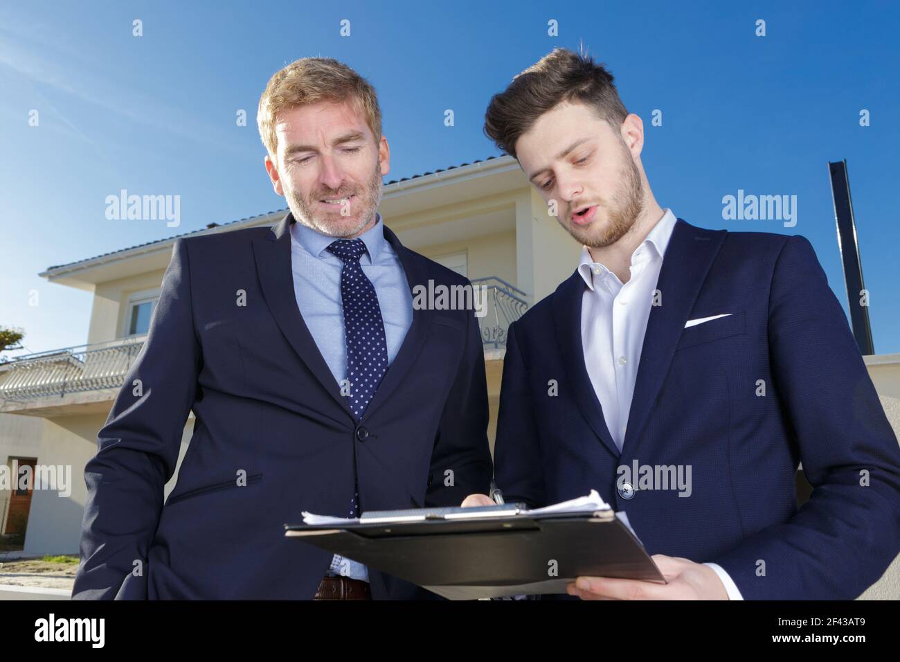 Professional suited outdoors hi-res stock photography and images - Alamy
