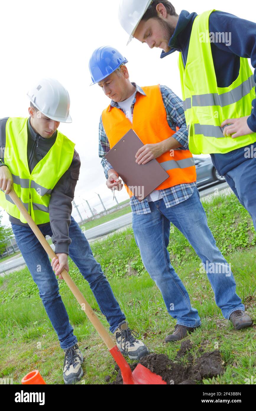 construction inspector surveying the digging process Stock Photo - Alamy