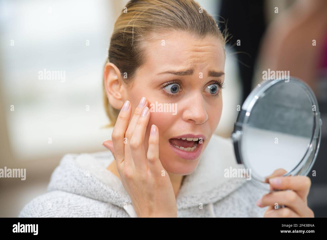 Anguished woman hi-res stock photography and images - Alamy