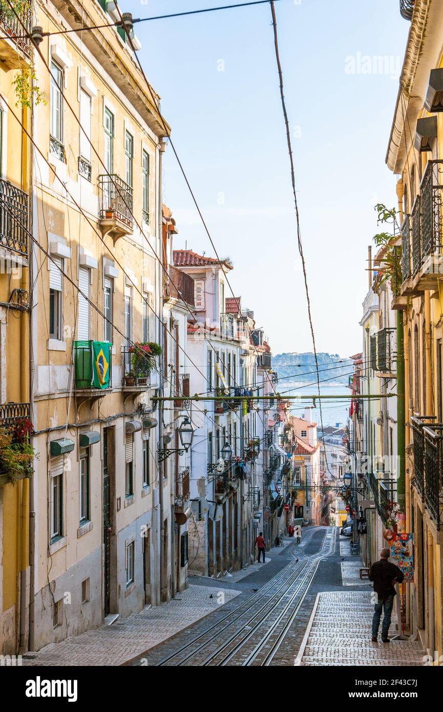 Rua da Bica de Duarte Belo, famous for its iconic yellow funicular ...