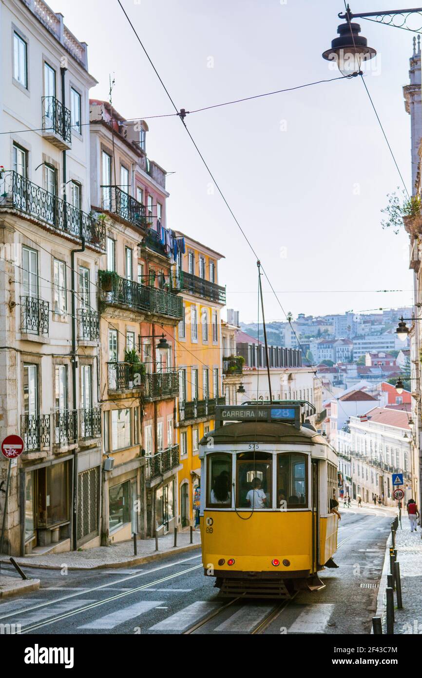 The iconic yellow Electrico (tram) in Calcada do Combro, in the ...