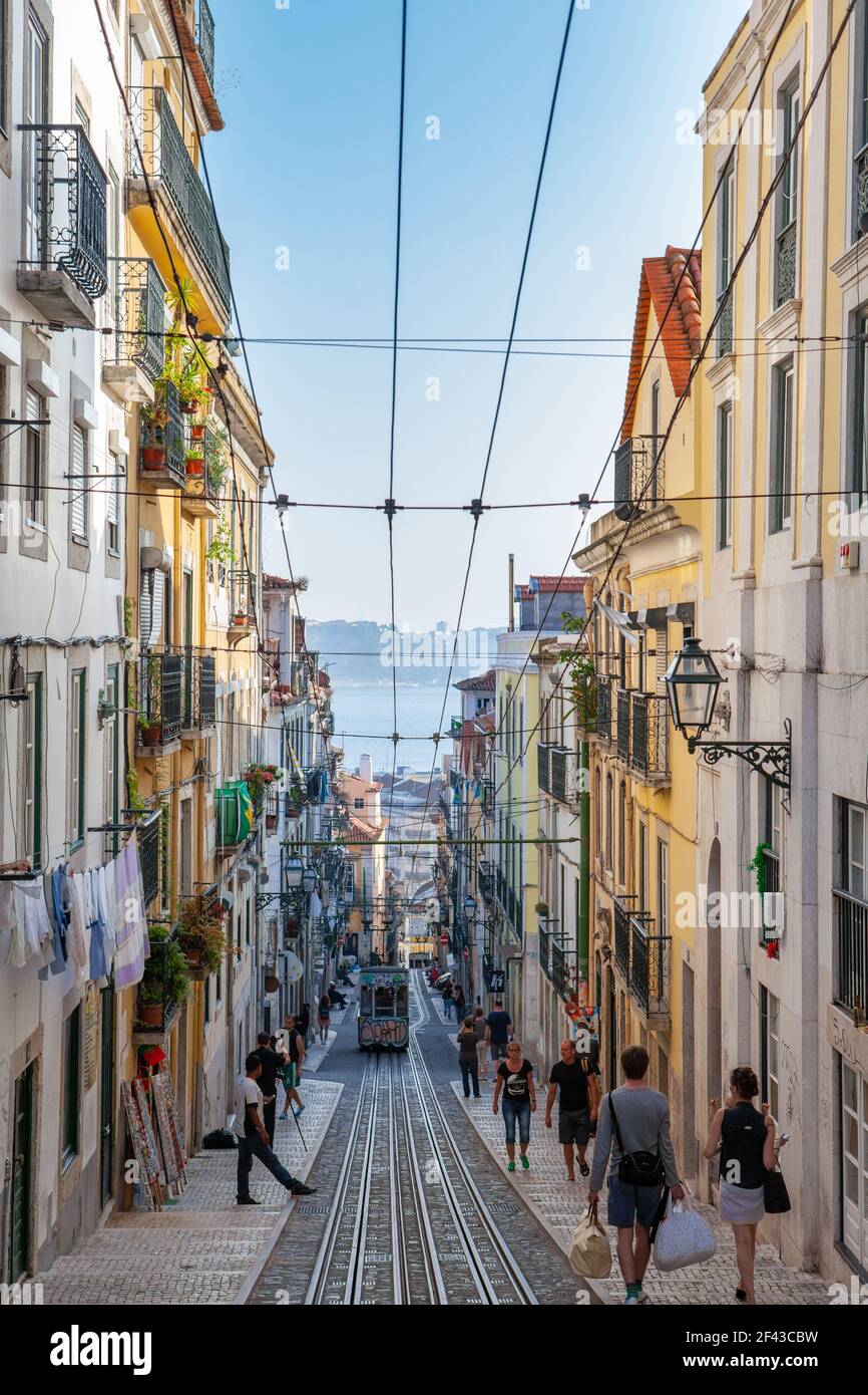 Rua da Bica de Duarte Belo, famous for its iconic yellow funicular ...