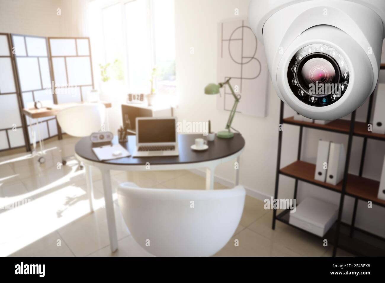 Modern CCTV camera installed in modern office Stock Photo - Alamy