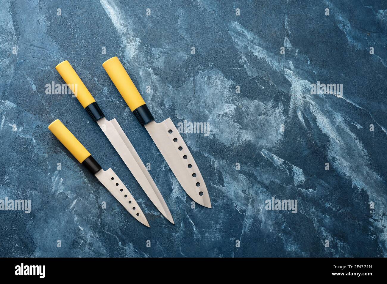 Set of knives on color background Stock Photo - Alamy
