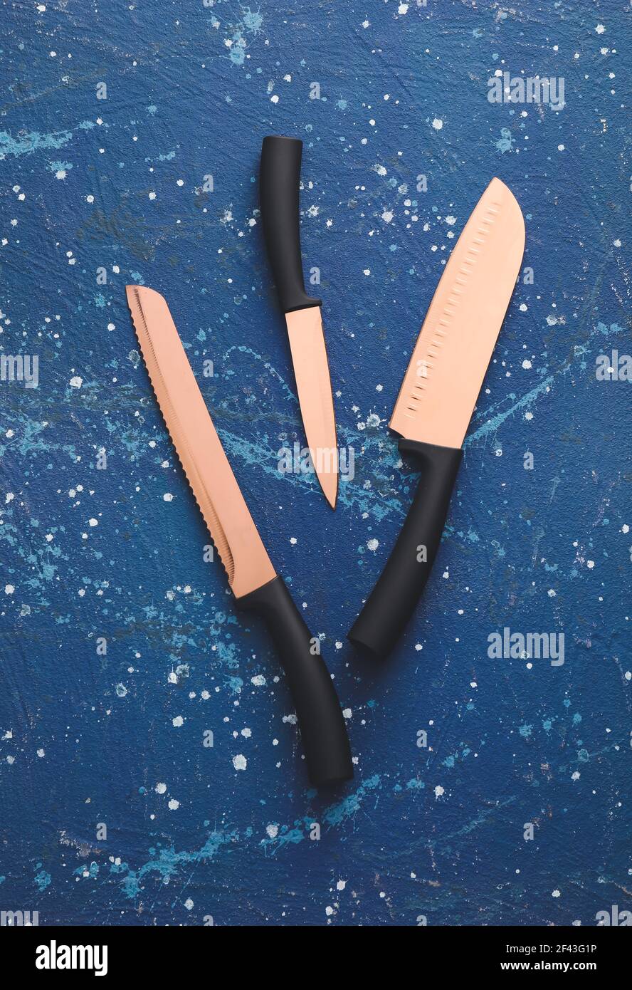 Set of knives on color background Stock Photo - Alamy