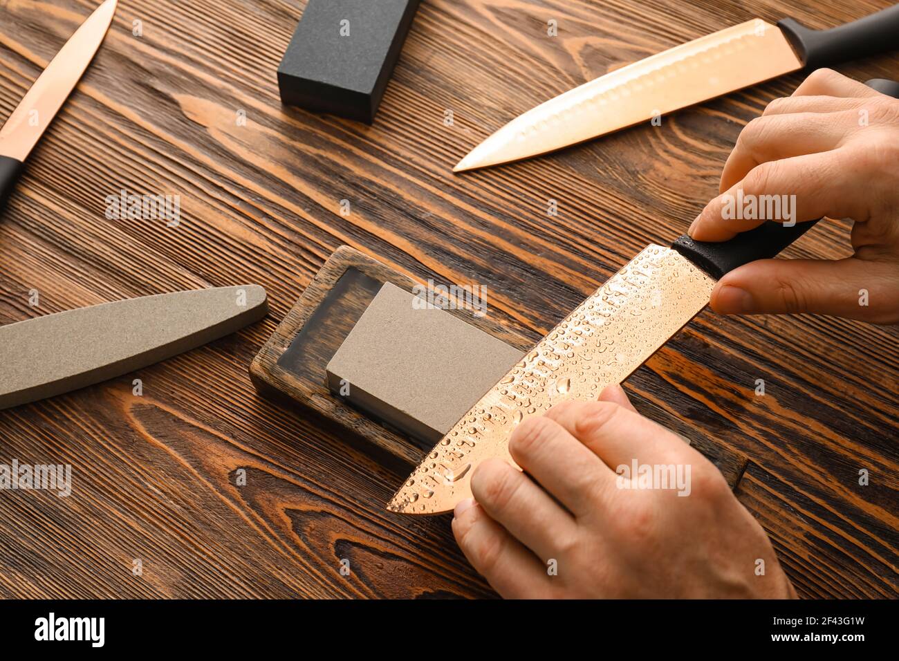 Man sharpening knife hi-res stock photography and images - Alamy