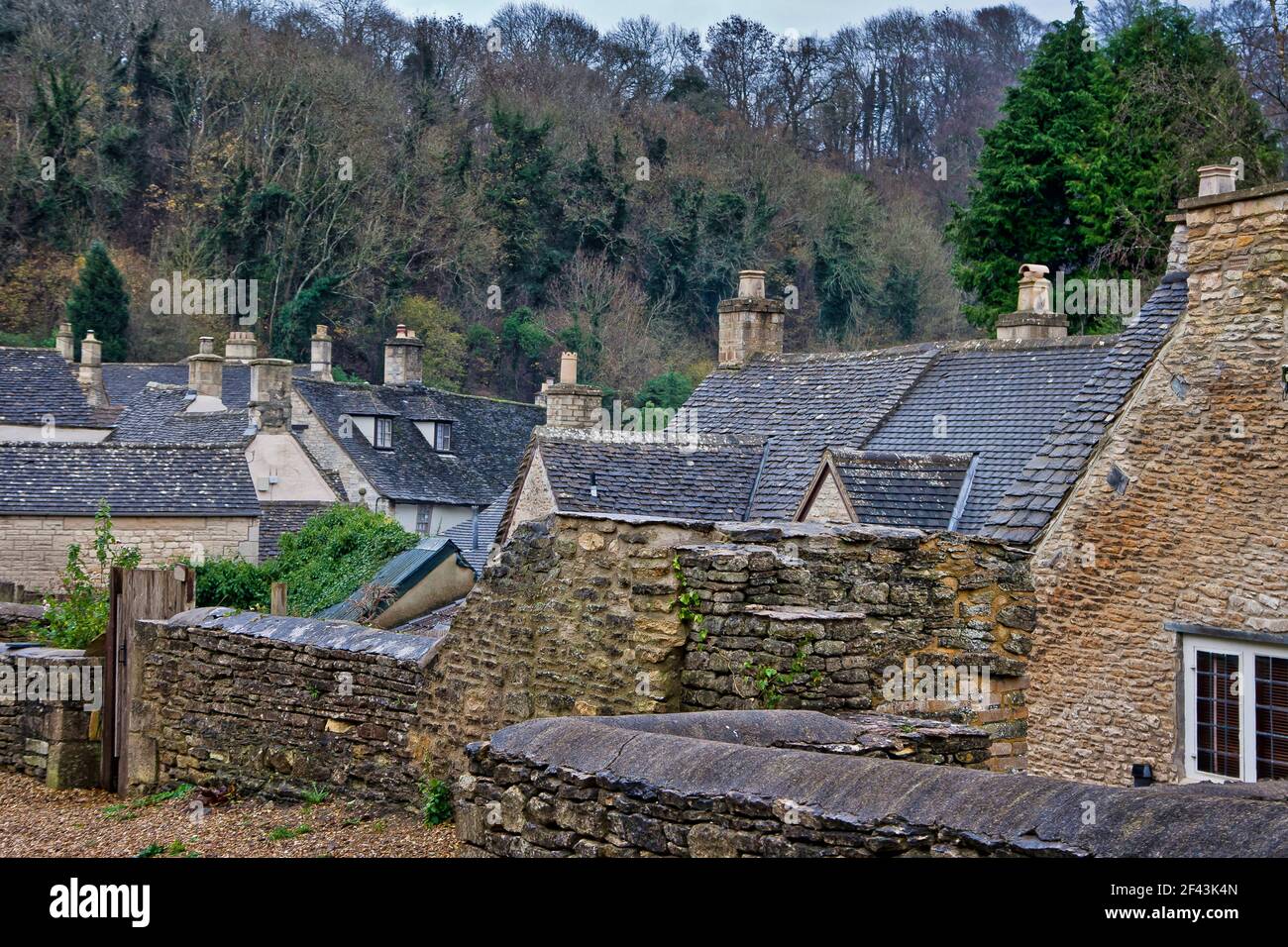 Rooftops and walls of the "historic" village of Castle Coombe Stock ...
