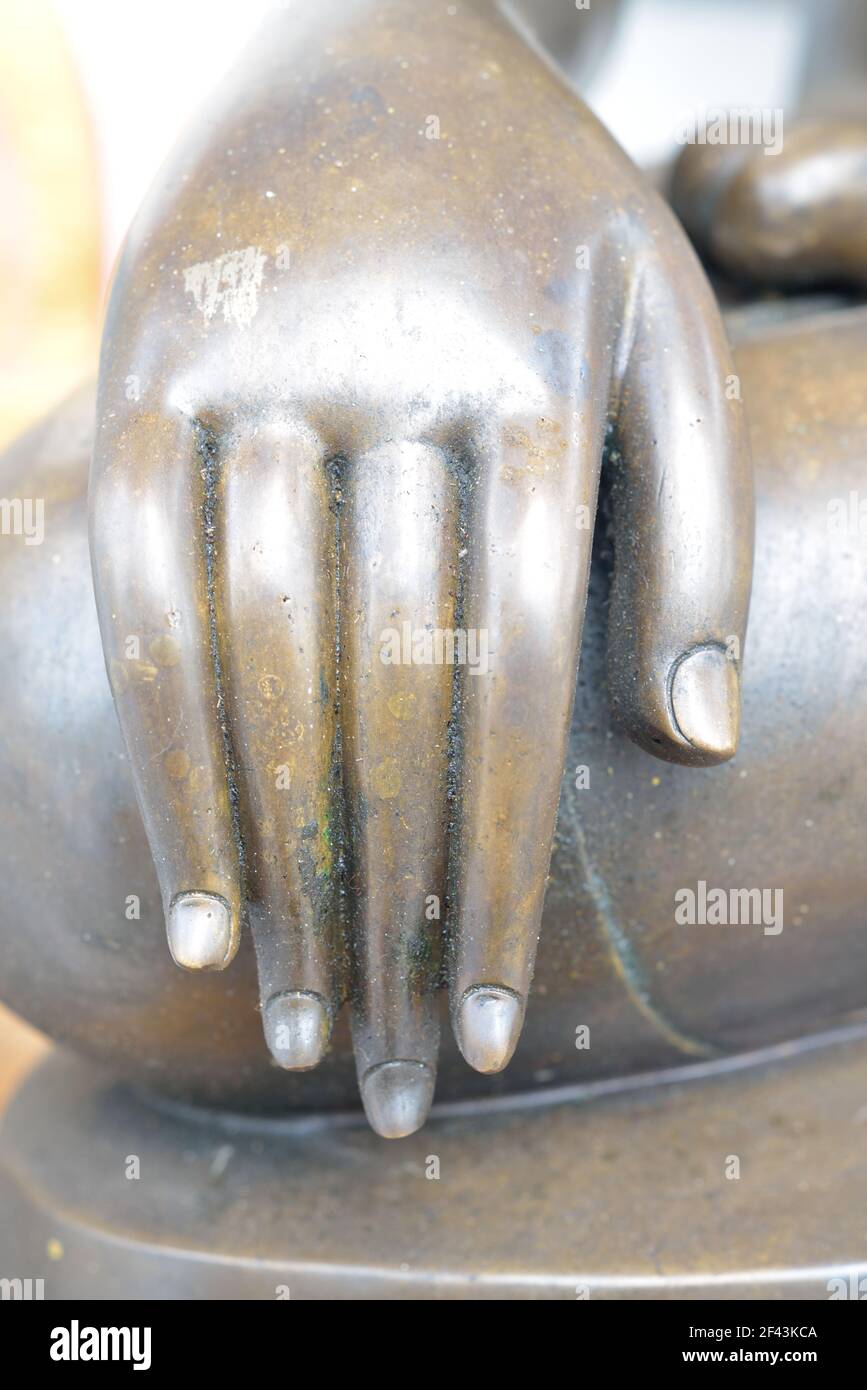 Hand of Buddha statue Stock Photo - Alamy