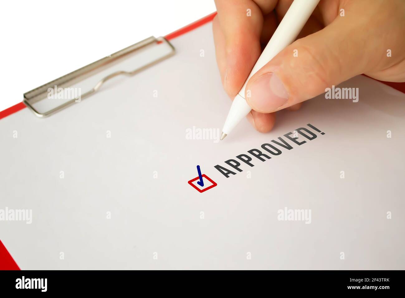 Plastic tablet with a white sheet of paper on a white background. View ...