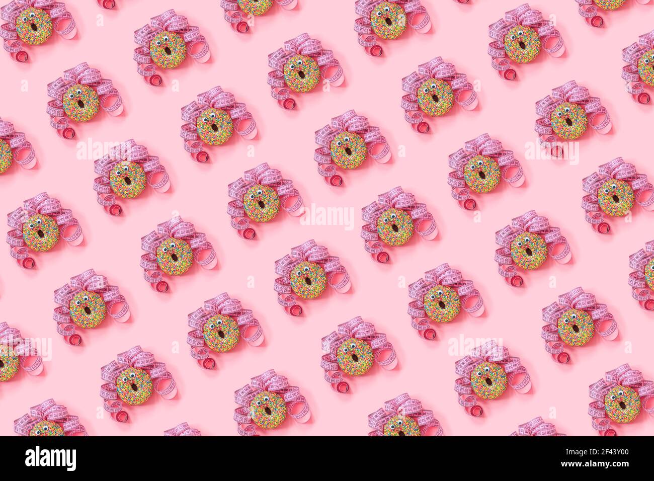 Donat pattern on pink background. Abstract funny face of woman from ...