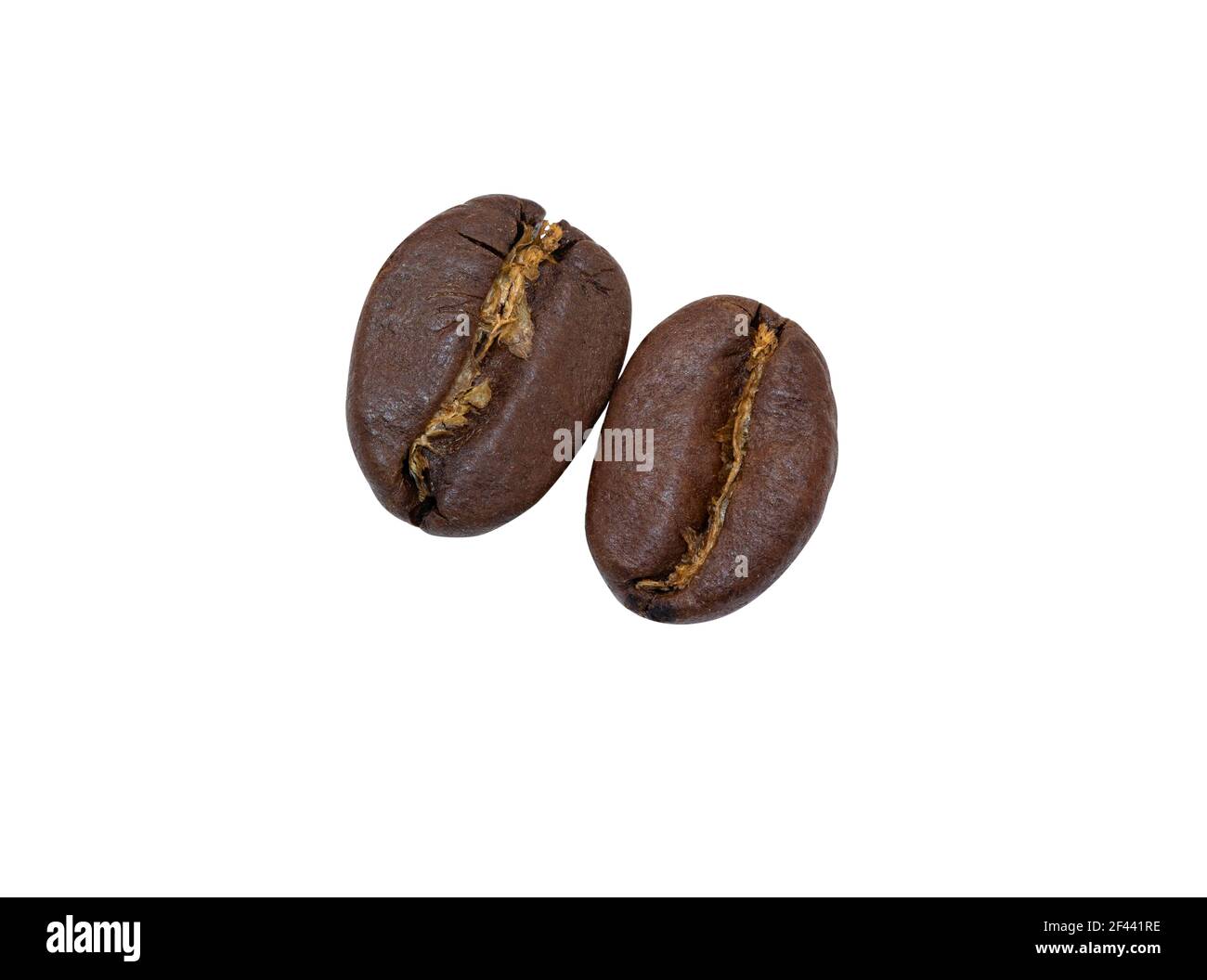 Roasted coffee beans, close-up. Coffee bean isolated on white. Two ...