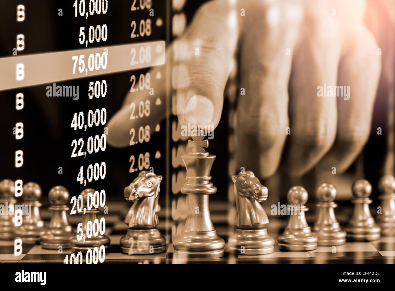 Chess game on chess board behind business man background. Business ...