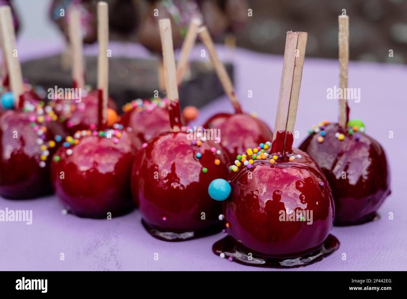 Candy Apples ready to sell at street faire Stock Photo - Alamy