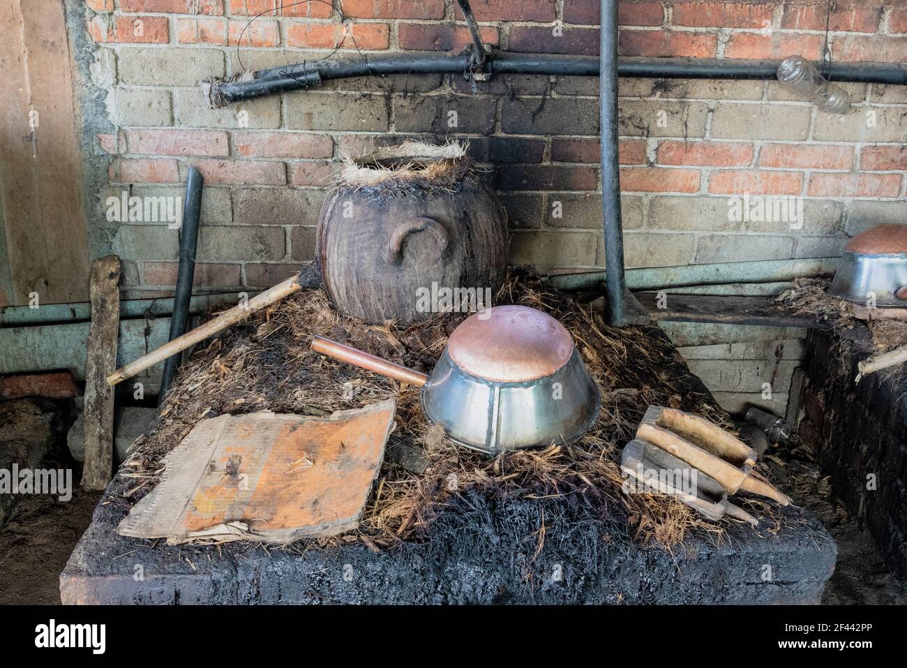 A copper bottom pot is used for condensation in the distillation of ...