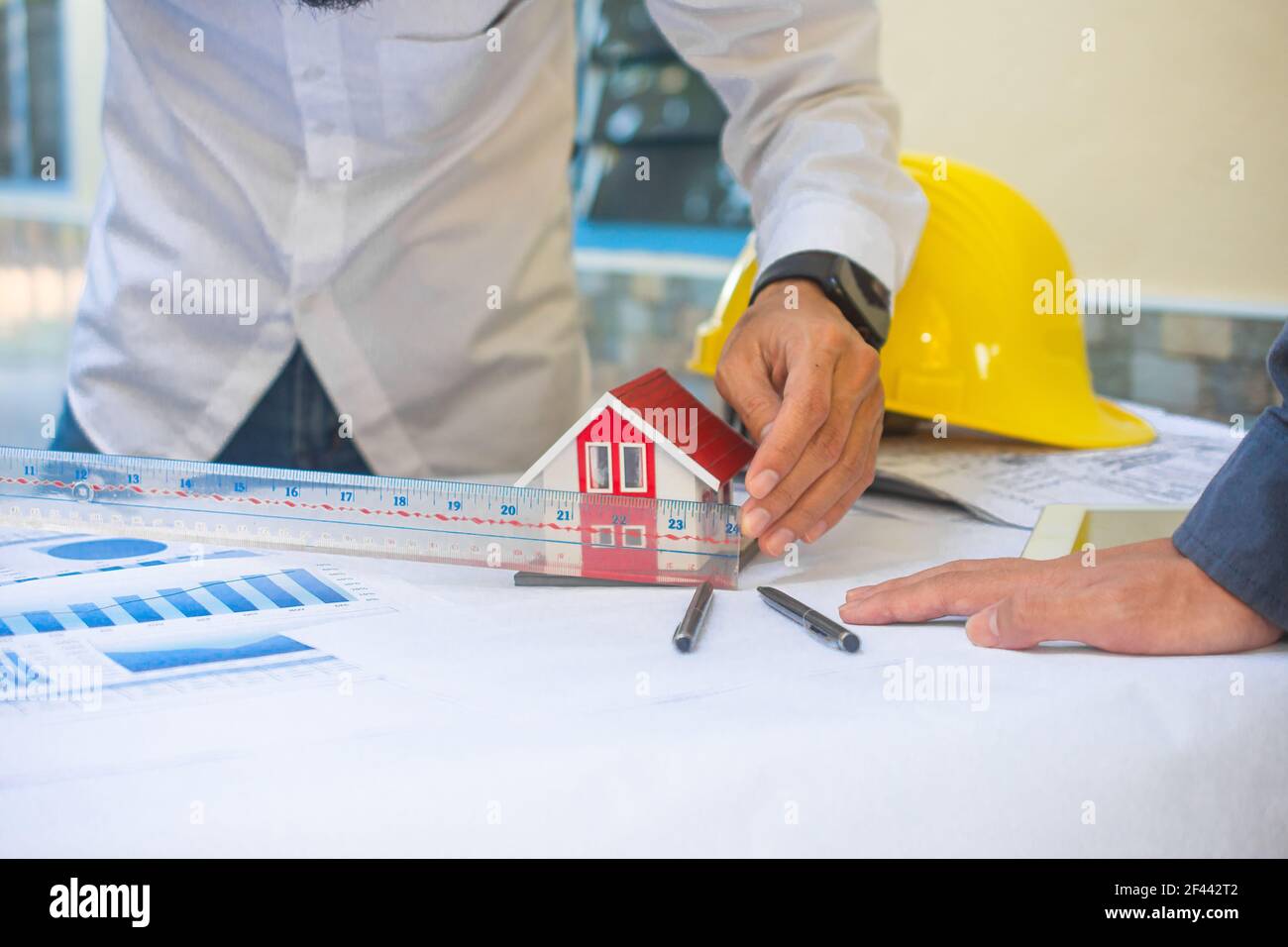 Engineer checking house blueprint real estate project hi-res stock ...