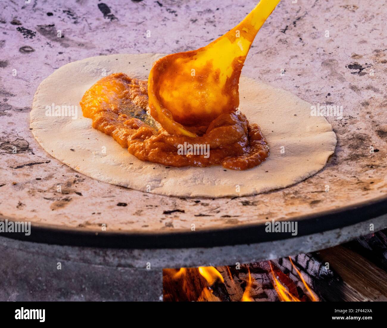 A chile relleno is made over an open fire Stock Photo - Alamy