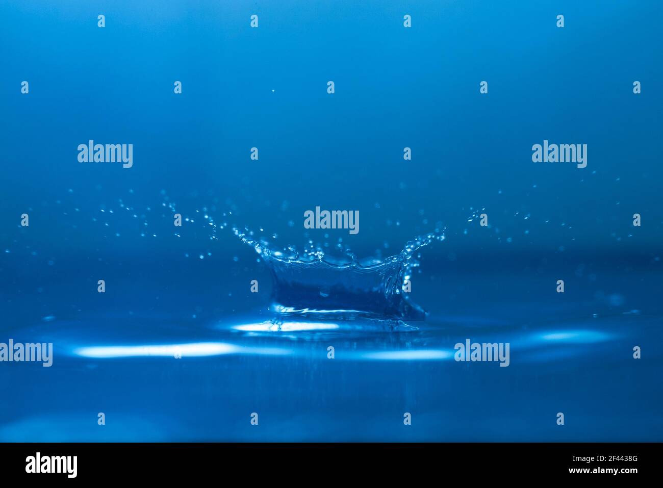 Drop of water. Blue water drop. Water splash close-up Stock Photo - Alamy