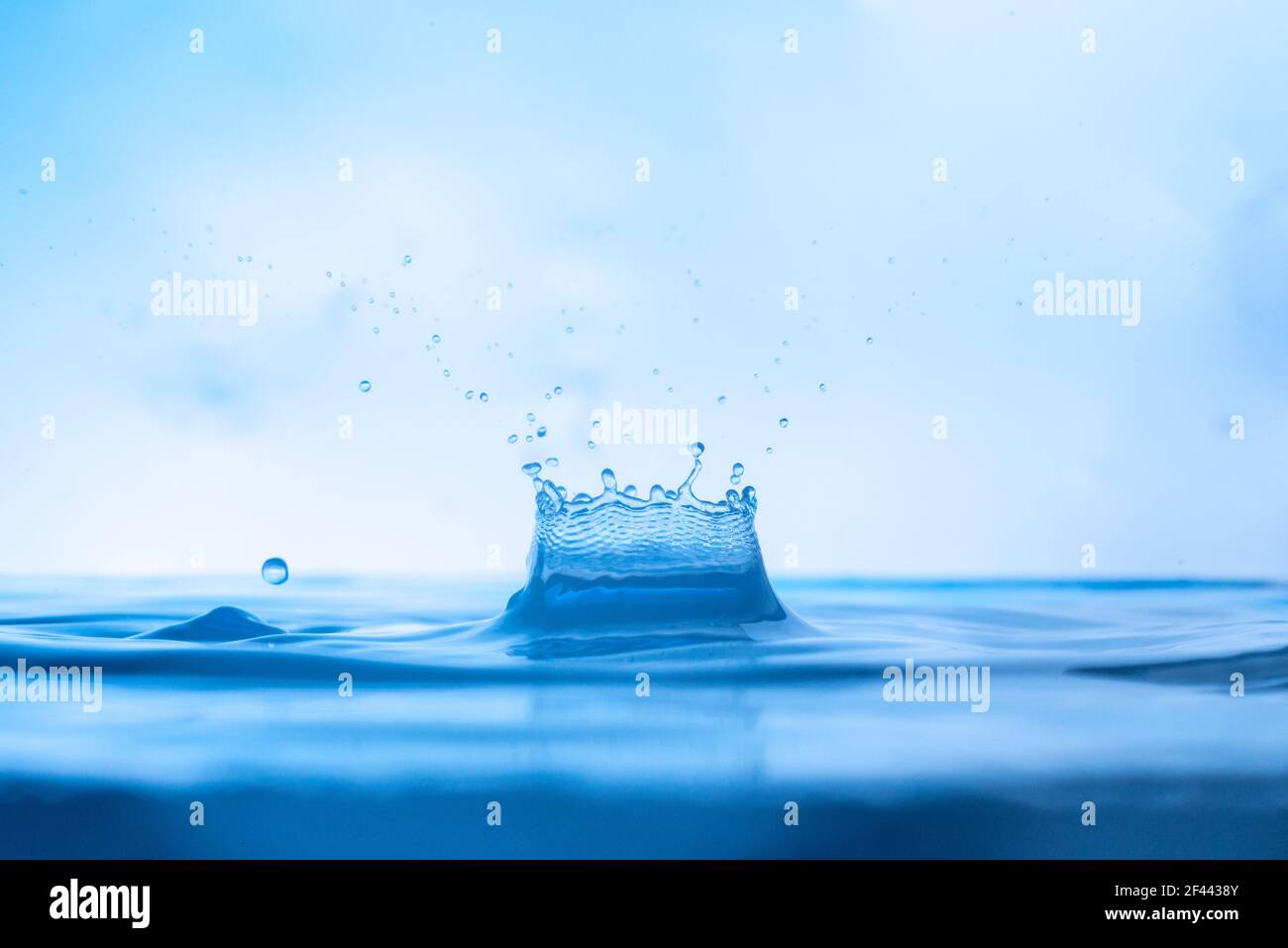 Drop of water. Blue water drop. Water splash close-up Stock Photo - Alamy