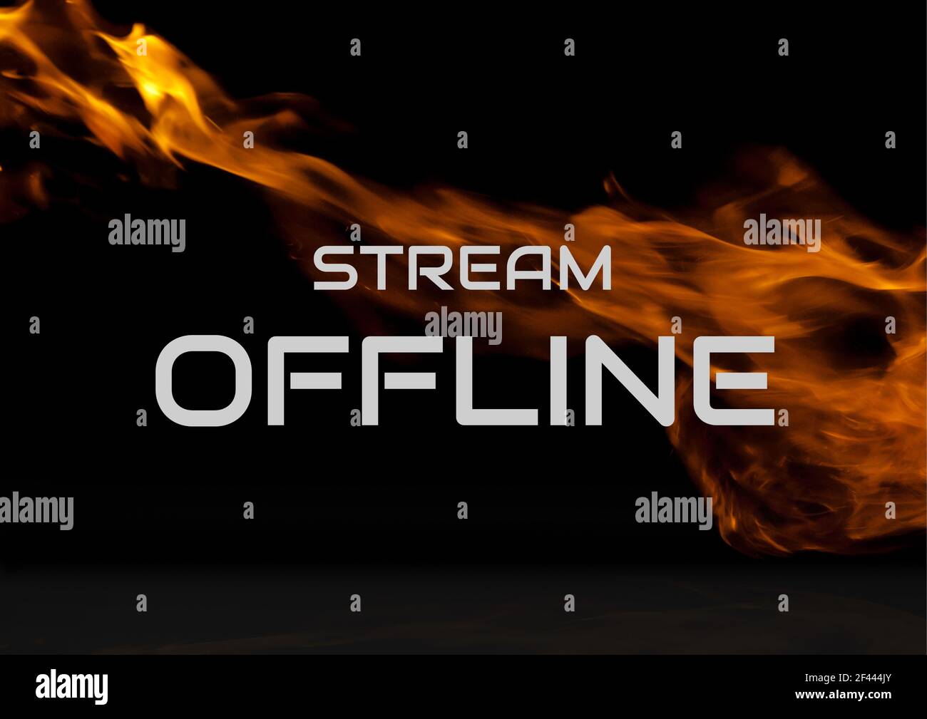 Digitally generated image of this stream offline text against fire on ...