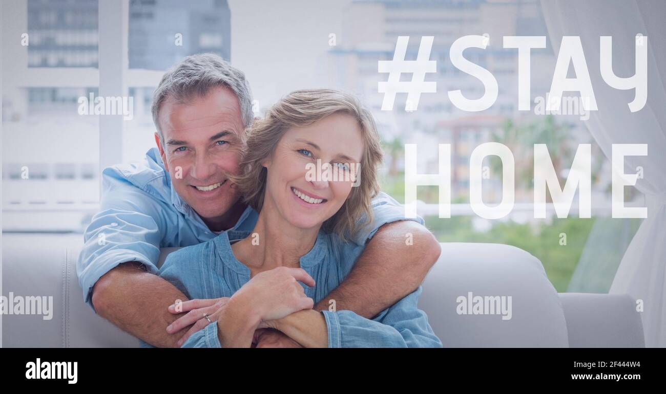 Couple hugging home hi-res stock photography and images - Alamy