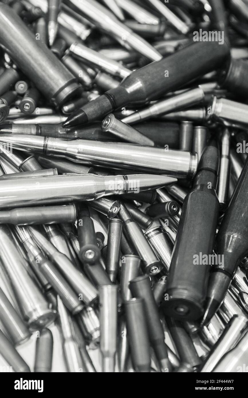 Pile of bullets. Close up of a lot of bullets. Gun violence in America ...