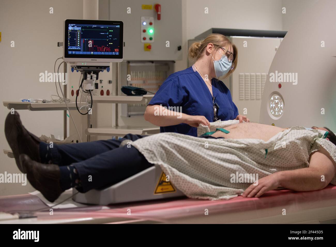 A patient is given a CT scan at the Royal Papworth Hospital, Cambridge ...