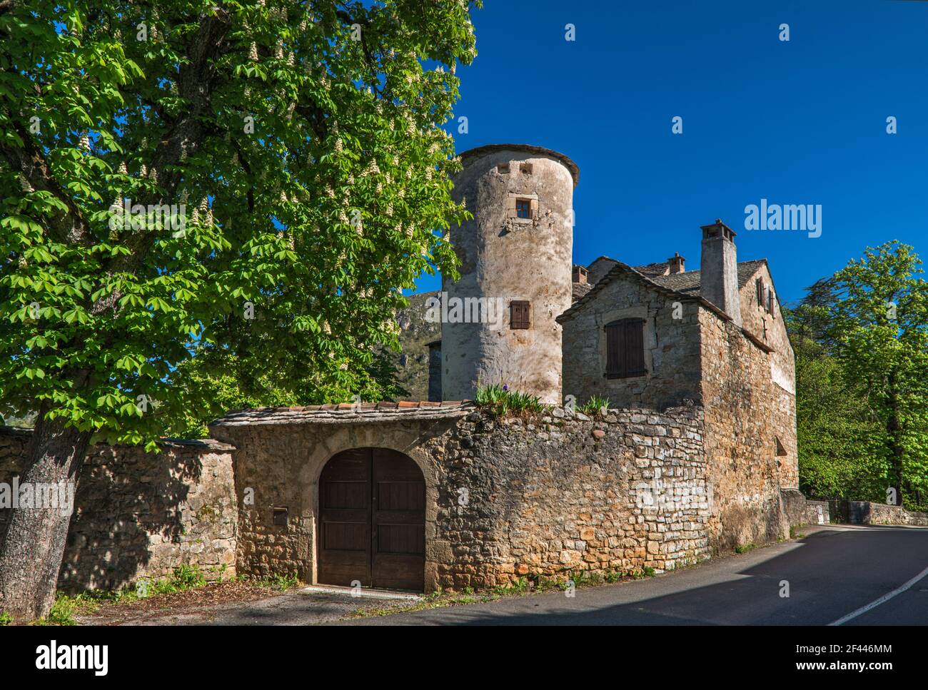 Medieval mansion in village of Le Rozier, commune in Lozere department ...