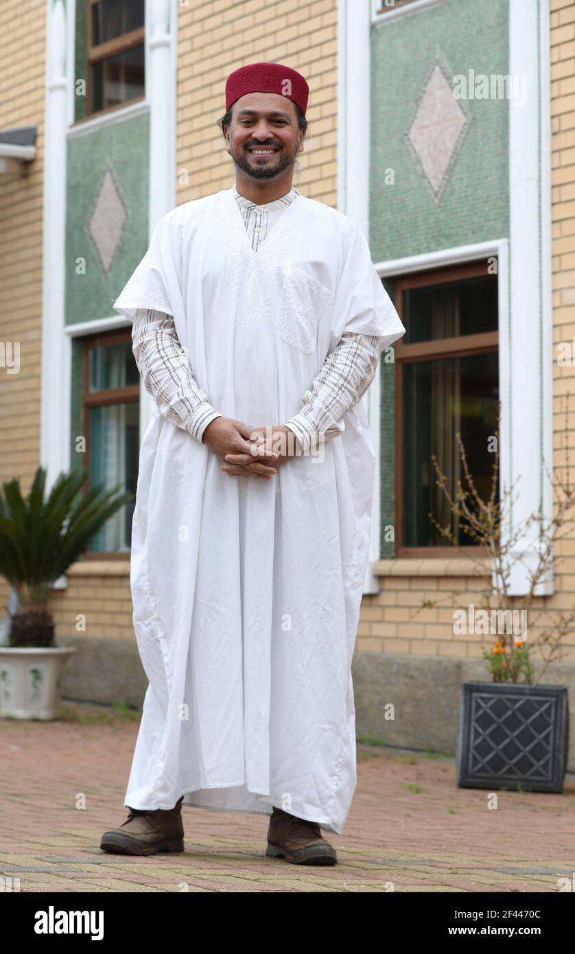 Imam Ajmal Masroor stands outside the London Islamic Cultural Society in London. Picture date ...